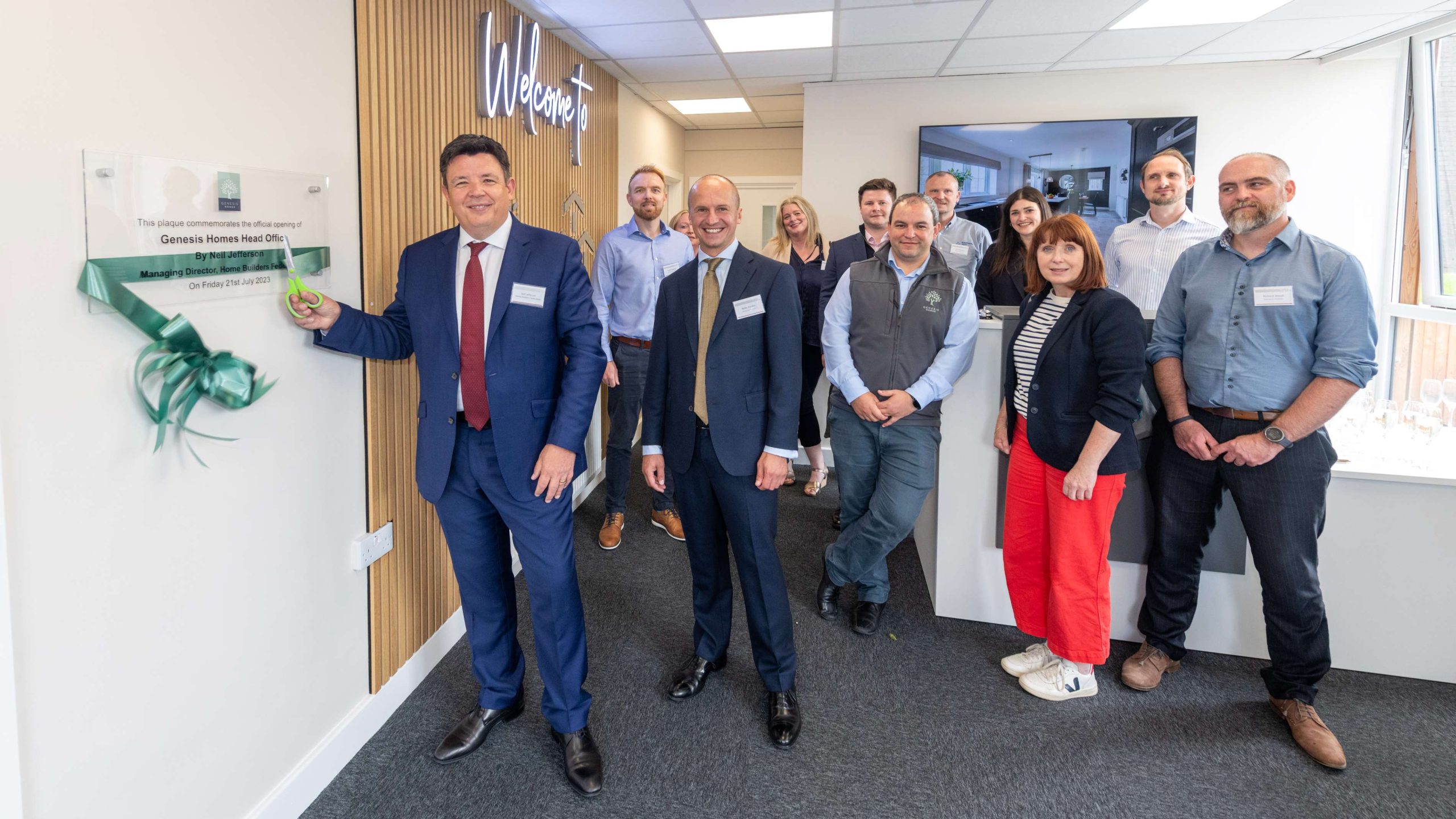 Esteemed house building chief cuts ribbon at our new £250,000 office ...